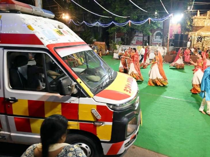 A Garba Pandal where an ambulance passes through the middle