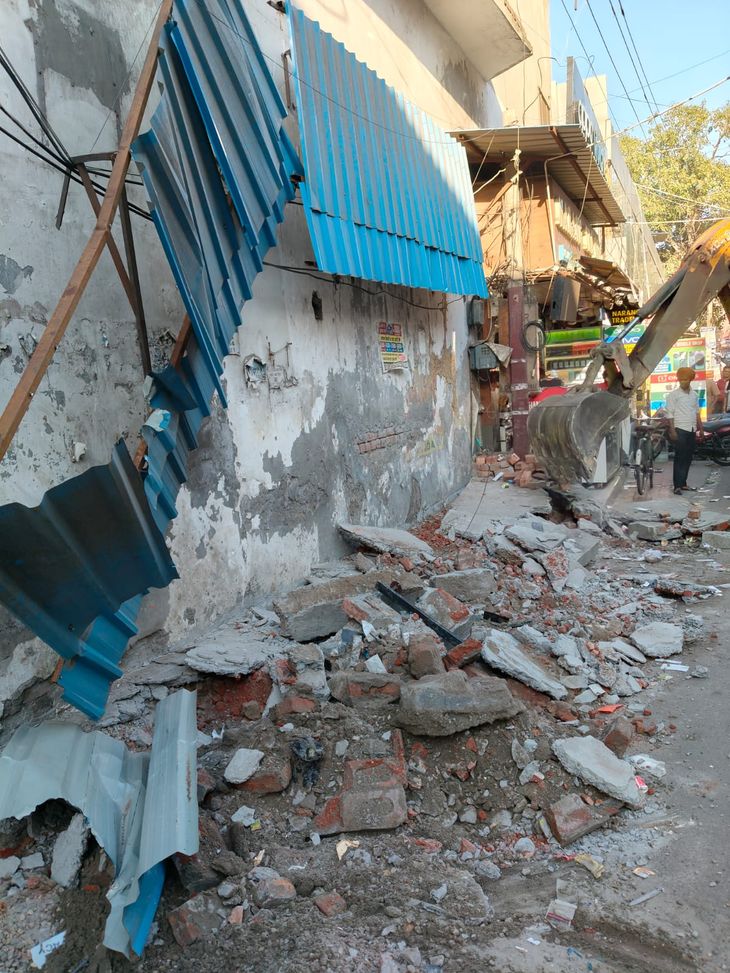 The building was demolished and the encroachment on the road was ...