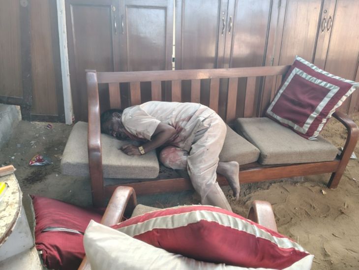 The body of a 50-year-old man was found soaked in blood