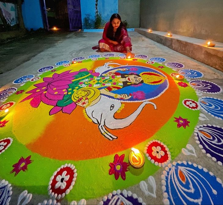 Rangoli made in the courtyard of the house on State Foundation Day ...