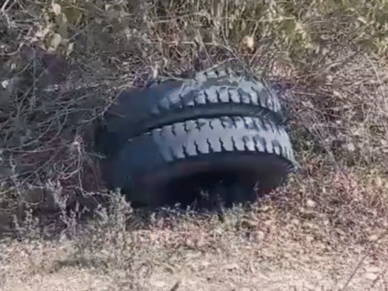 The truck overturned after its wheel came off due to a pothole on the ...