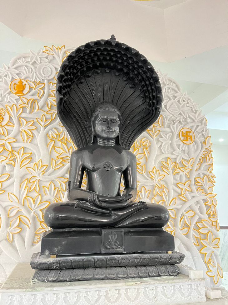 Lord Parshvanath seated on the altar in the Jain temple of ...