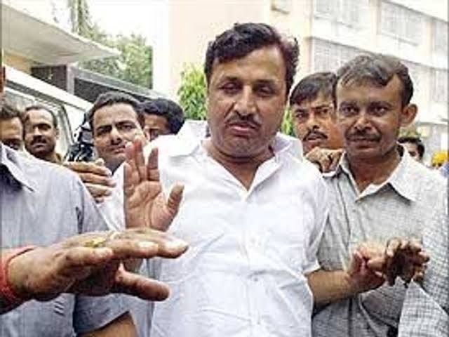 Former minister Amarmani Tripathi declared absconding