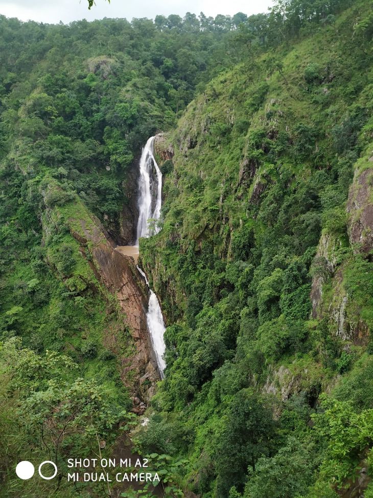 Water falling from a height of 450 feet in Makrabhanja waterfall is ...