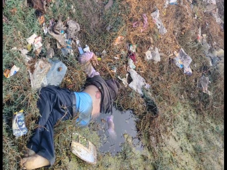 The body of a young man was found in a pit filled with water