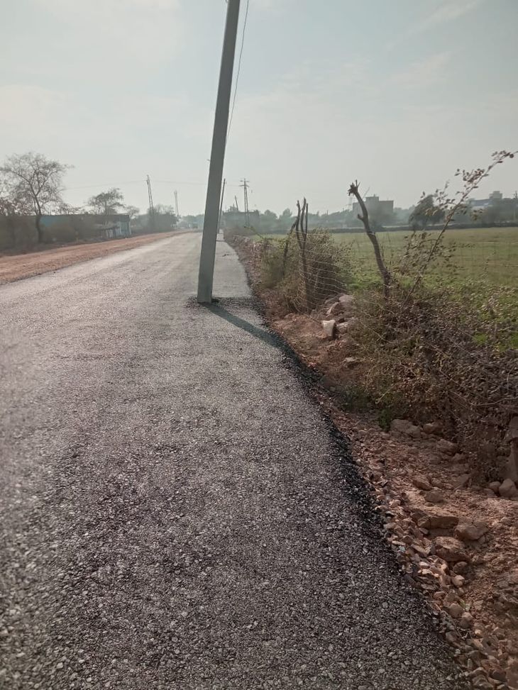 60 feet road is being built instead of 80 feet, poles and transformers ...