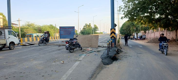 Near the overbridge, first bricks were laid and then mortar was put on ...