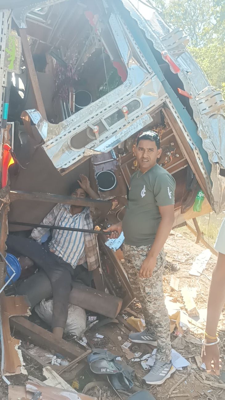Truck collided with a tree and overturned, driver and helper got stuck ...