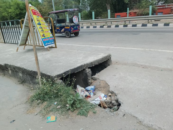 Broken drain cover near railway station