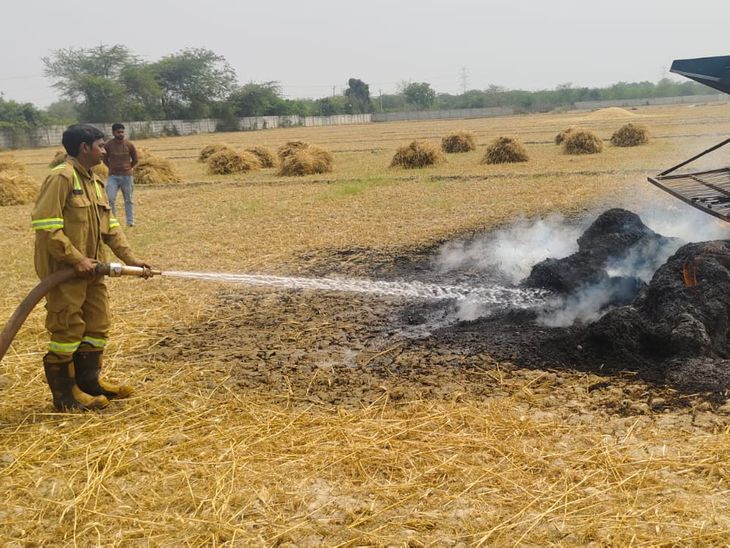 A spark from a thresher caused a fire in the field