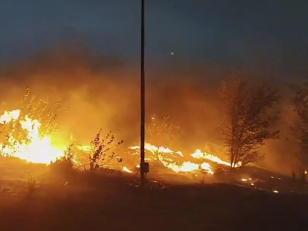 Dry grass caught fire near Kumbharam Dam