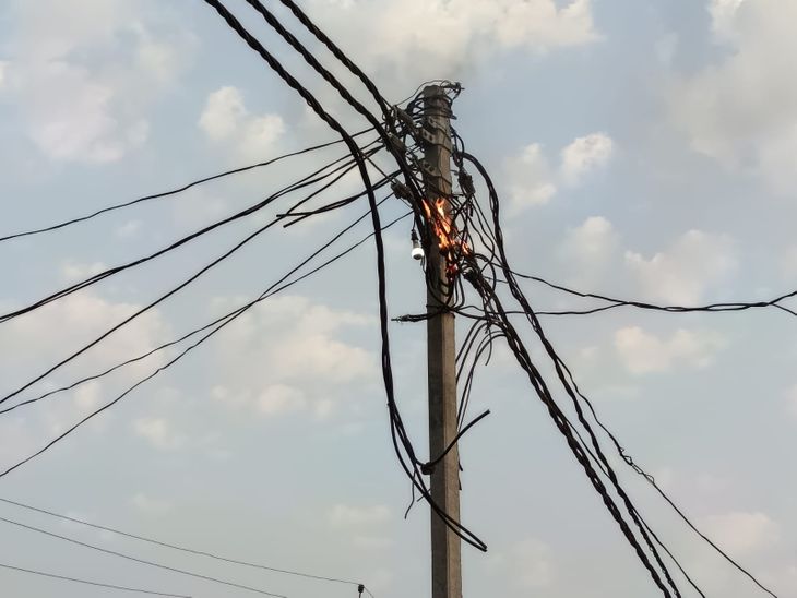 Power supply disrupted due to burning of power lines | बिजली के तार ...