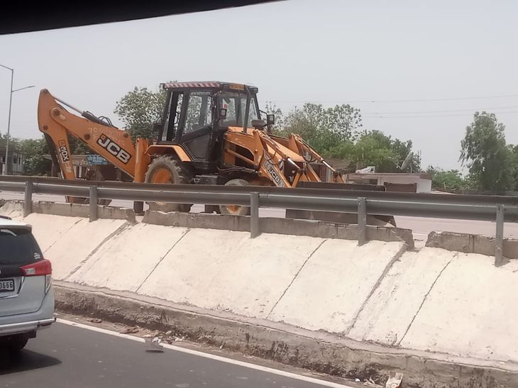 A damaged bulldozer has been parked on the four-lane road in Hatabazar ...