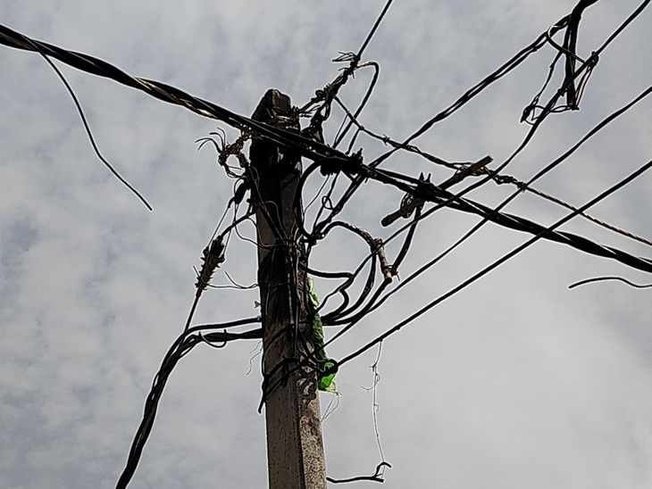 loose wires hanging on electric poles