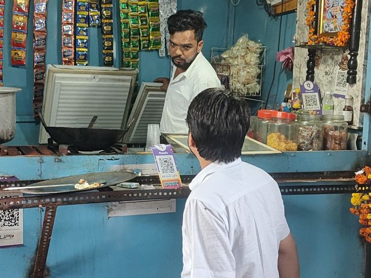 Action on the premises of wine shop under Simrol Overbridge
