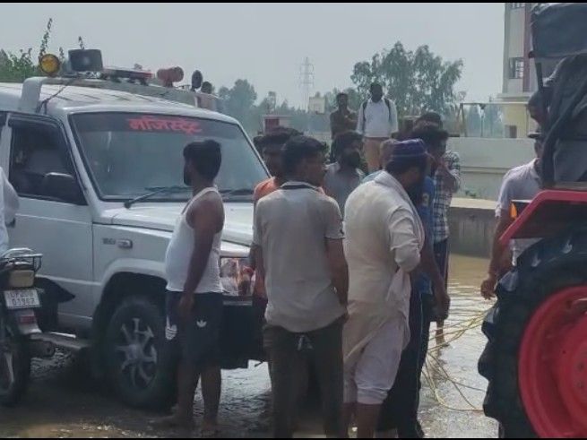 Waterlogging on the road due to rising water level of Malan river