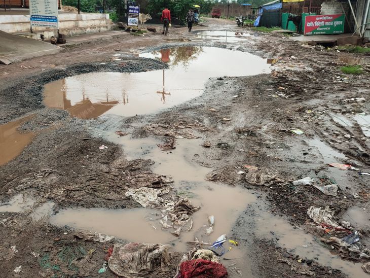 The road built 13 years ago has become dilapidated, potholes everywhere ...
