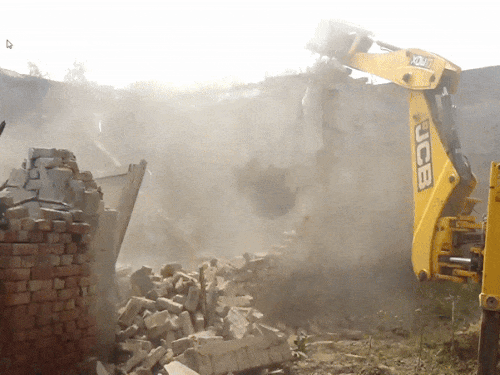 Punjab police ran a bulldozer on the house of a drug smuggler Update