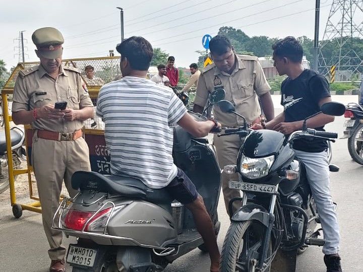 12 vehicles were challaned for not wearing helmets and carrying triple ...