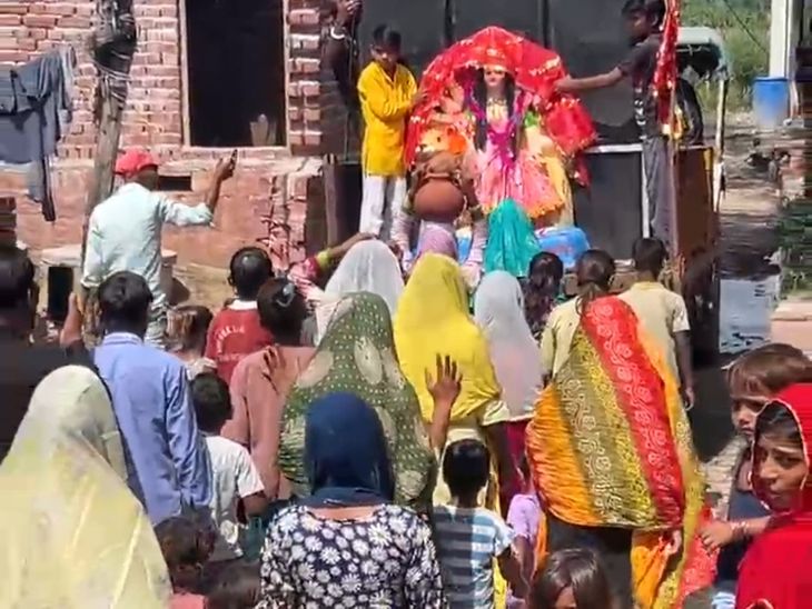 Installation of Maa Durga after the morning procession in Nagla ...