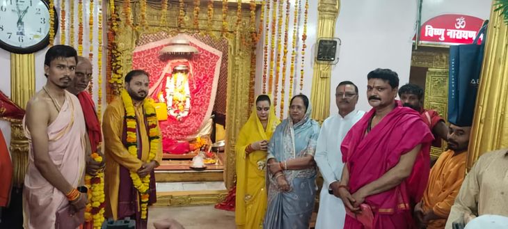 After worshipping a 201-year-old gun, the temple priest distributed ...