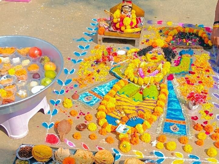 A figure of Lord Govardhan was made from cow dung and children were ...