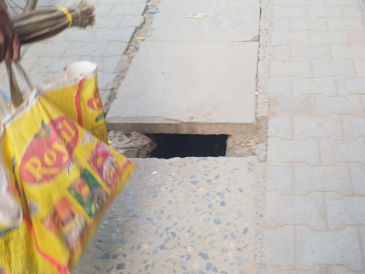 Broken drain cover in Baburi Bazaar