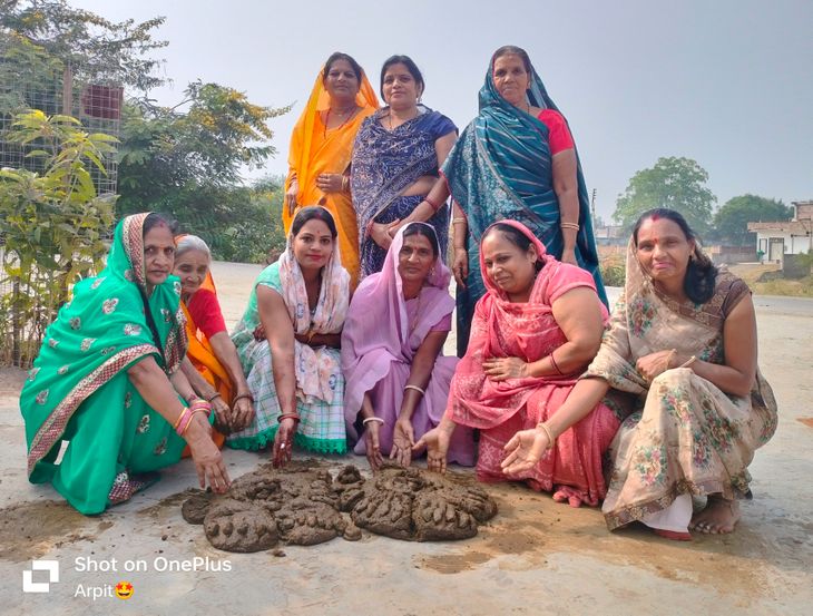 Idols of Govardhan Ji were decorated with cow dung in every house and ...