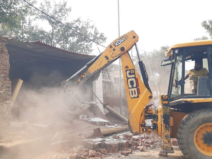 Illegal encroachment removed from cremation ground land in Tikri ...