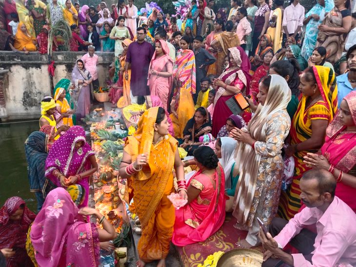 Devotees thronged the ghats and ponds, offering prayers to the setting ...