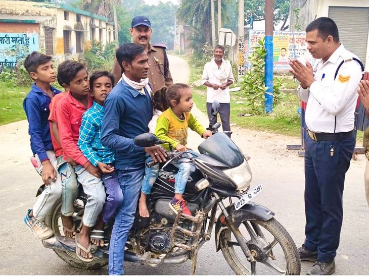 In Hapur, the police officer stood with folded hands in front of the youth.
