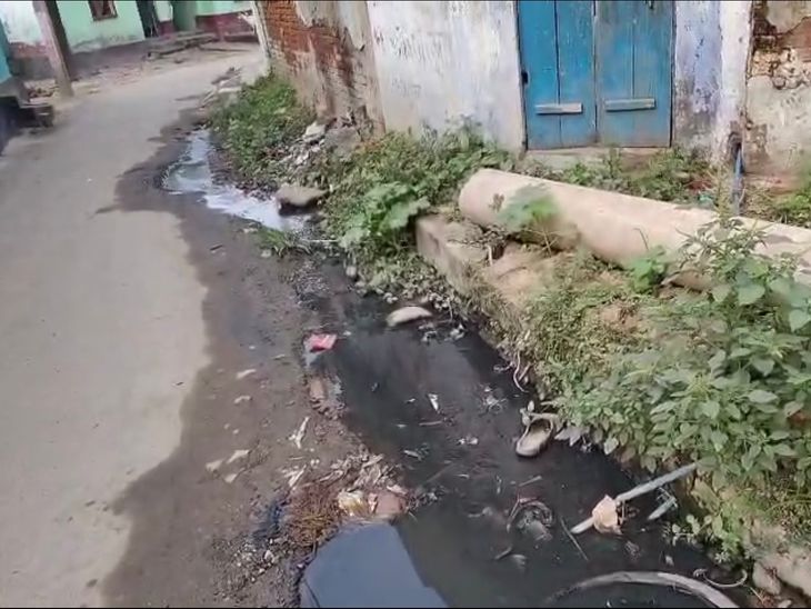 Dirty water from houses on the streets in Patna village