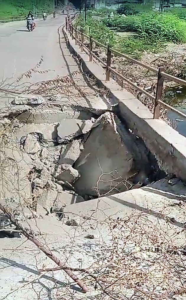The bridge collapsed, blocking the way to two dozen villages. | पुल ...