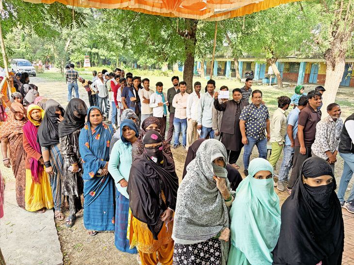 Voting continued to pick up as the day progressed, with mobile phones ...