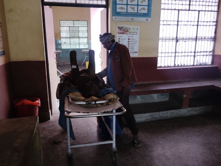 Elderly man burns while warming himself by a bonfire in Katghara village