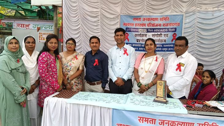 Wearing a red ribbon, running a signature campaign and making people ...