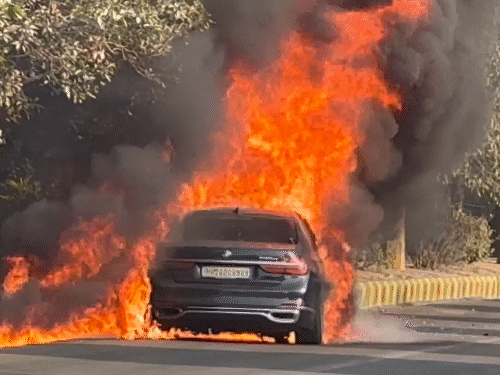 A moving BMW car catches fire in Noida