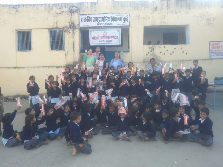 Modern Swastik Mahila Mandal distributed warm sweaters
