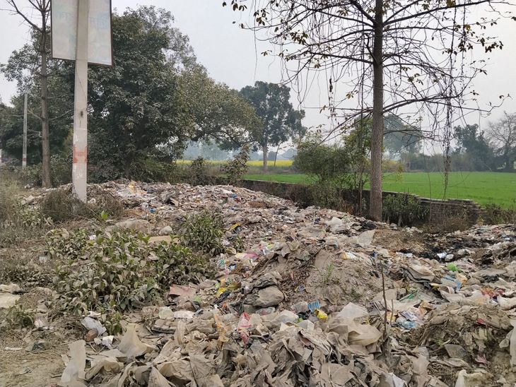 A pile of garbage on the road near the temple in Jaithra