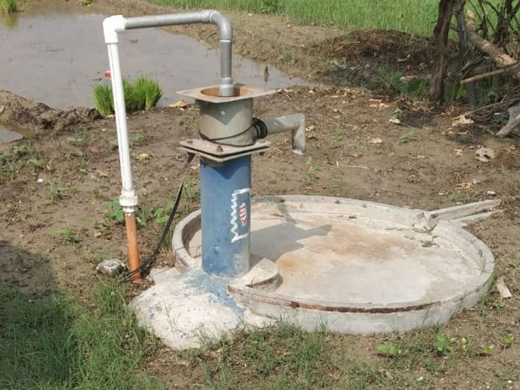 Hand pump pipe caught in high tension wire