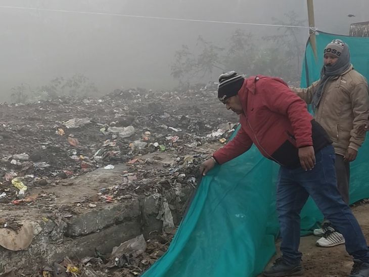 Panchayati Raj Department covered the garbage heap