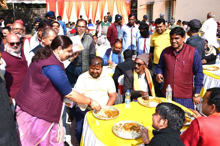 Local people participated in the MLA's Dahi-Chuda feast.