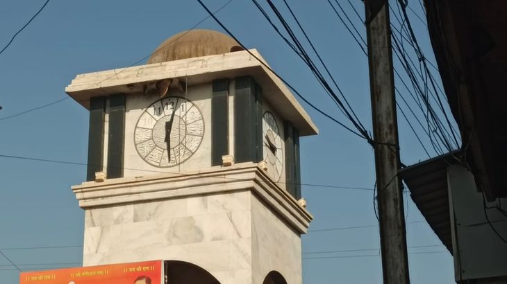 The clock shows different times in all four directions.