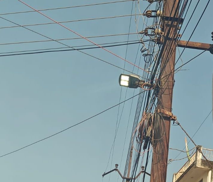 Disorganized power lines in Mararpara, lights remain on even during the day