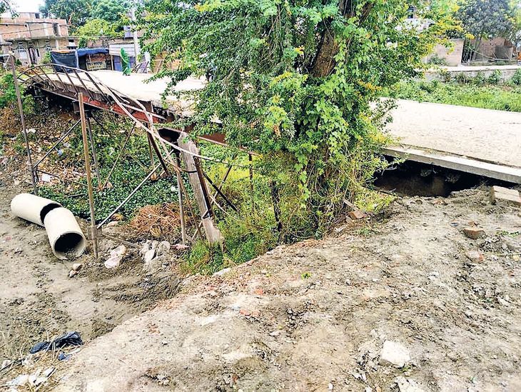 Potholes on the bridge, broken railings, construction not started even ...