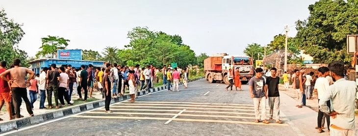 A middle-aged man died after being hit by a truck loaded with bamboo ...