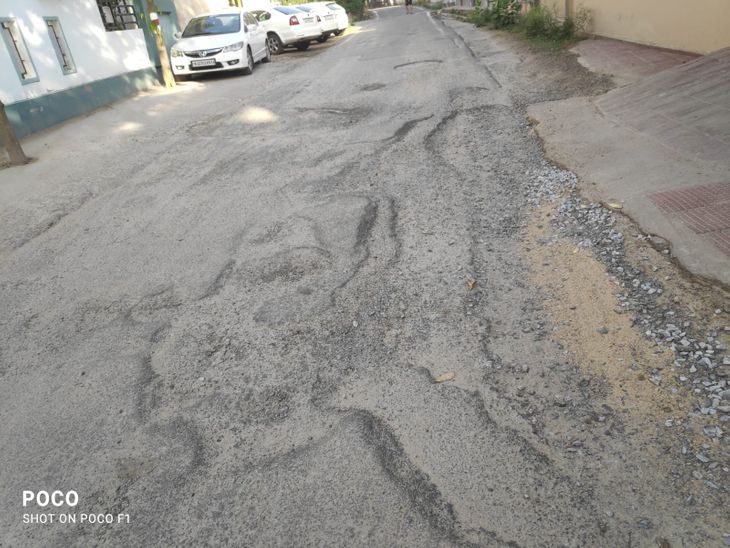 Saheli Nagar's main road is in a dilapidated state, with potholes and ...