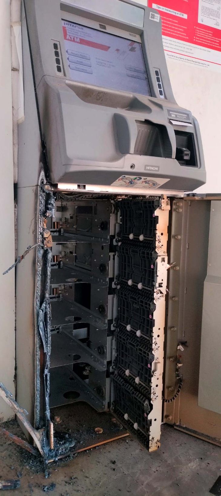 The thieves sprayed CCTV cameras with spray, then cut open the ATM with ...