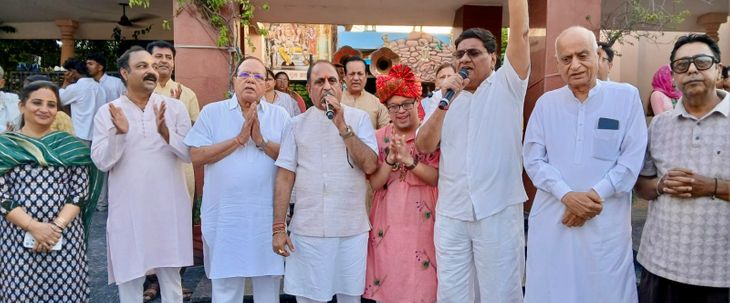 Weekly gathering celebrated with cow service and chanting of Mahamantra
