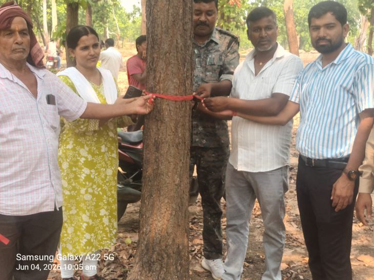 On World Environment Week, villagers pledge to protect trees.
